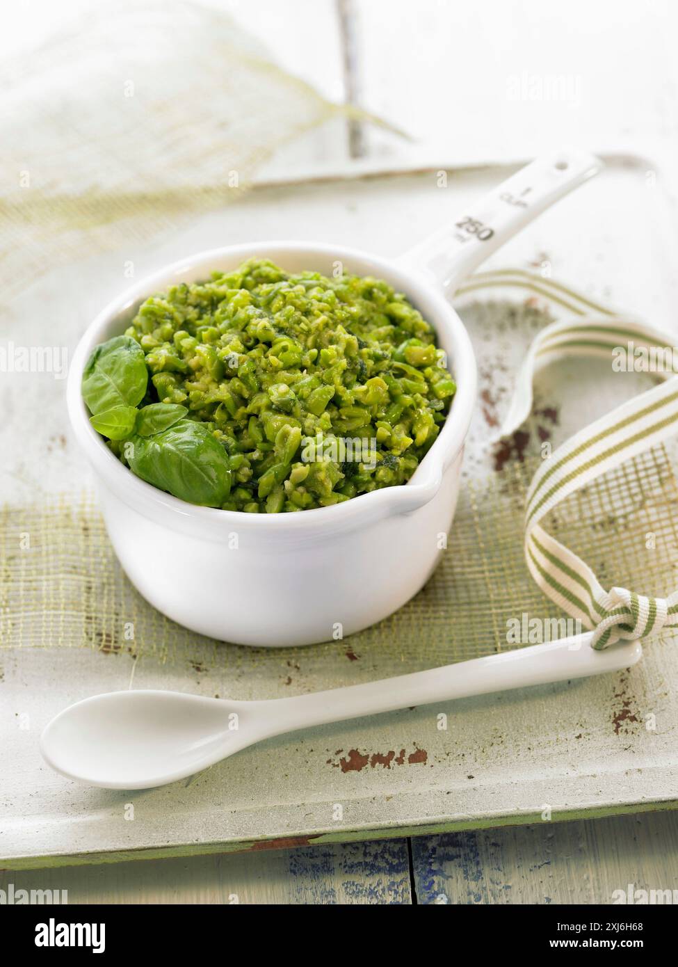 Mashed pea paste with basil Stock Photo - Alamy