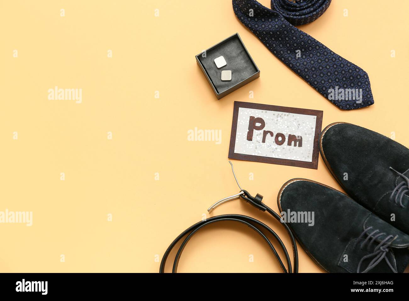 Word PROM with male shoes, tie and belt on beige background Stock Photo ...