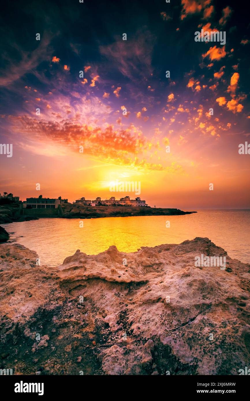 Coastal sunset over town, Kyrenia, Northern Cyprus, Turkey Stock Photo ...