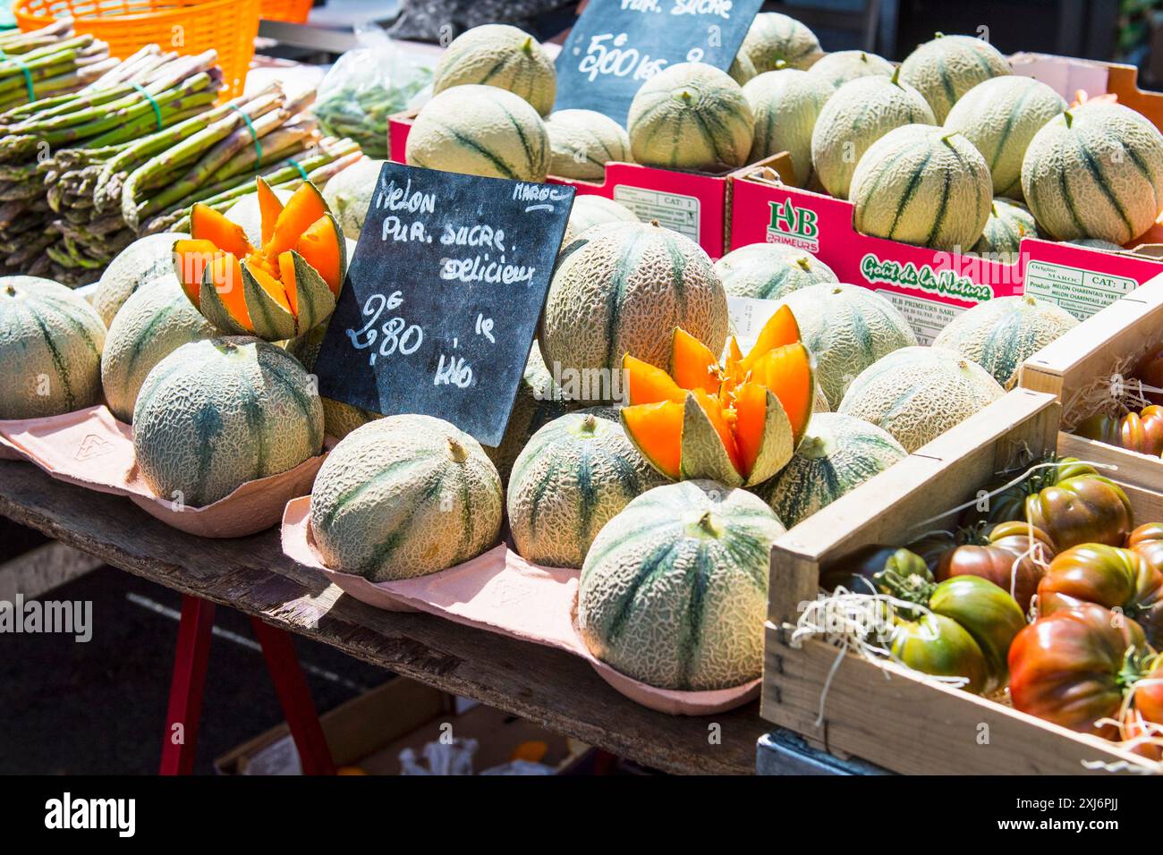 Melons on a market stall Stock Photo - Alamy