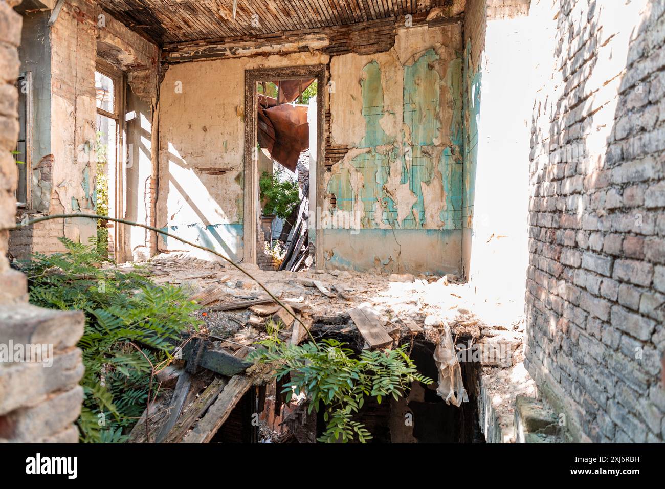 Abandoned and partly collapsed traditional Georgian home in the old ...