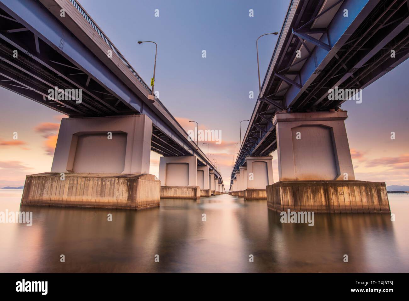 Biwako Ohashi Bridge (Lake Biwa bridge) over lake Biwa at sunset ...