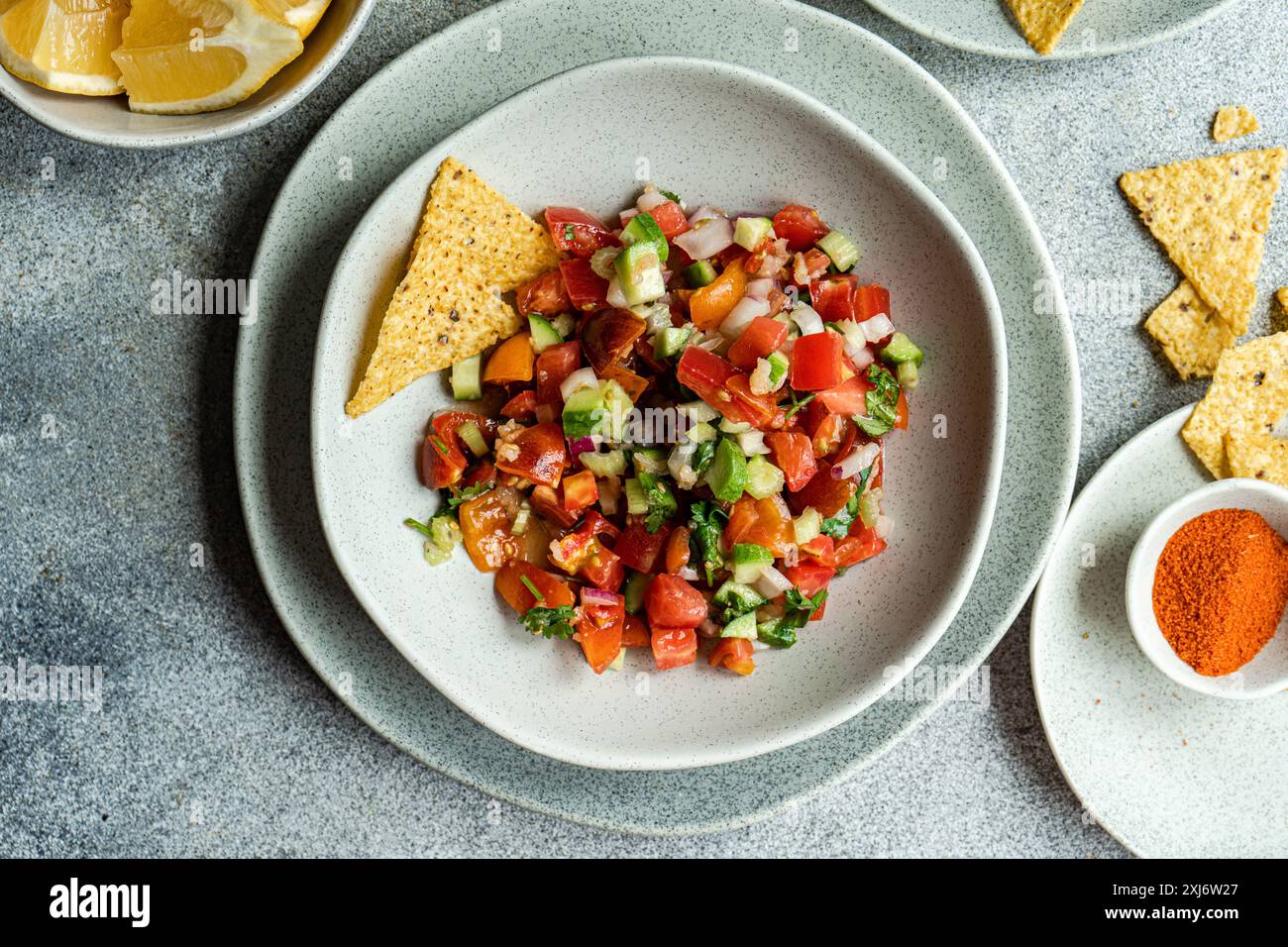Overhead view of a bowl of Traditional Mexican Pico de Gallo salsa with ...