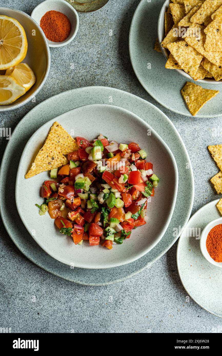Overhead view of a bowl of Traditional Mexican Pico de Gallo salsa with ...