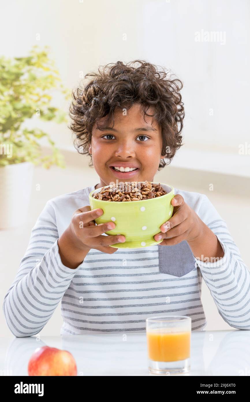 Boy eating cereal hi-res stock photography and images - Alamy