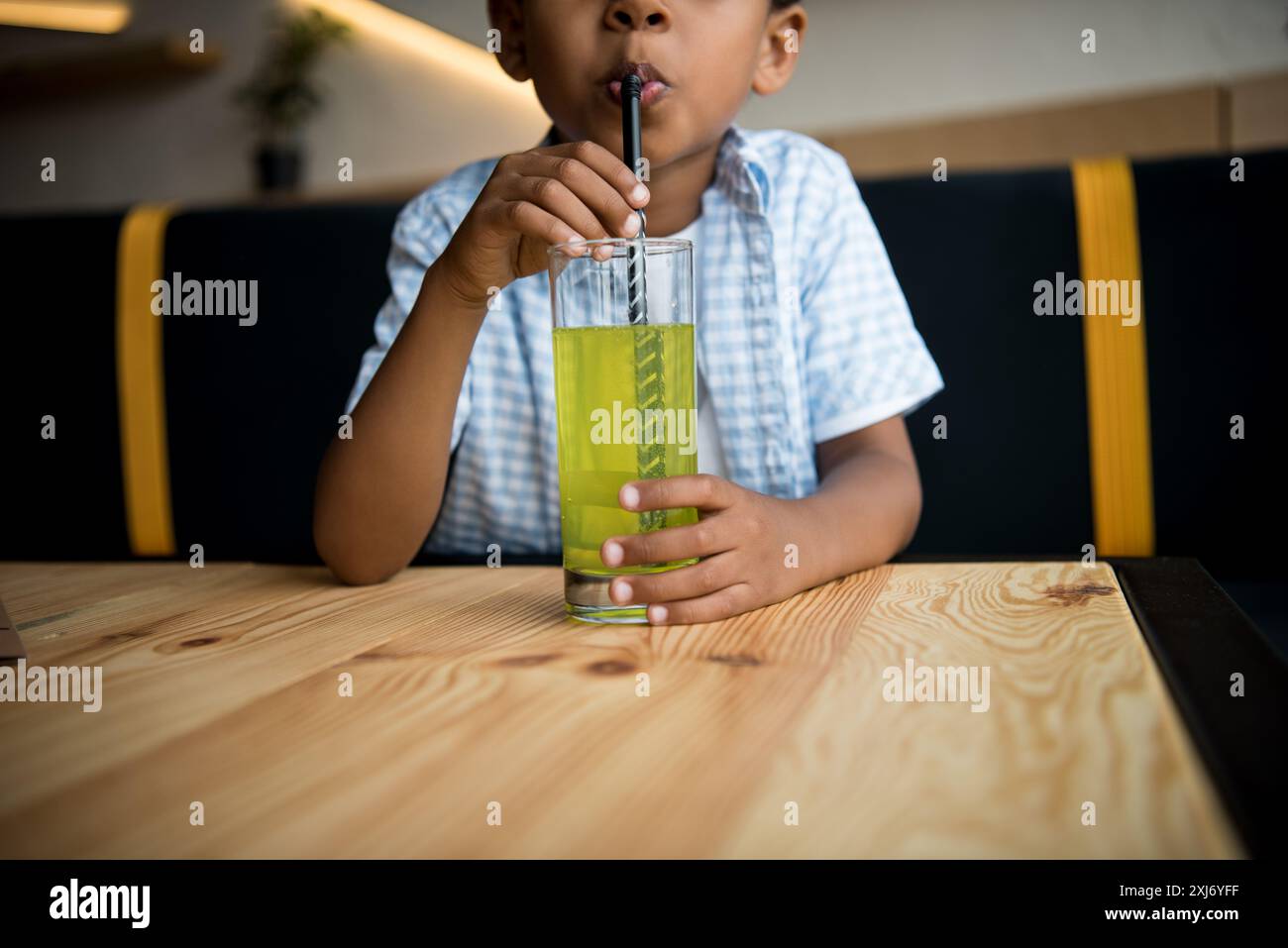 African american child drinking lemonade Stock Photo - Alamy
