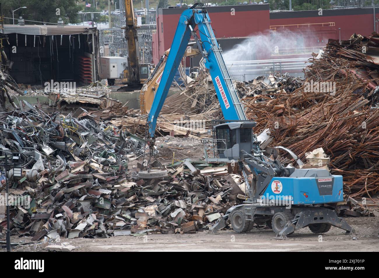 Demolition crews process and remove tons of materials from the decommissioned coal burning power ...