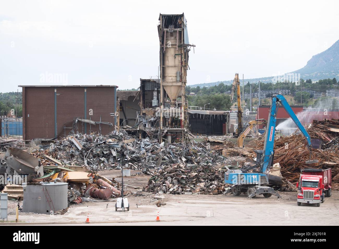 Demolition crews process and remove tons of materials from the ...