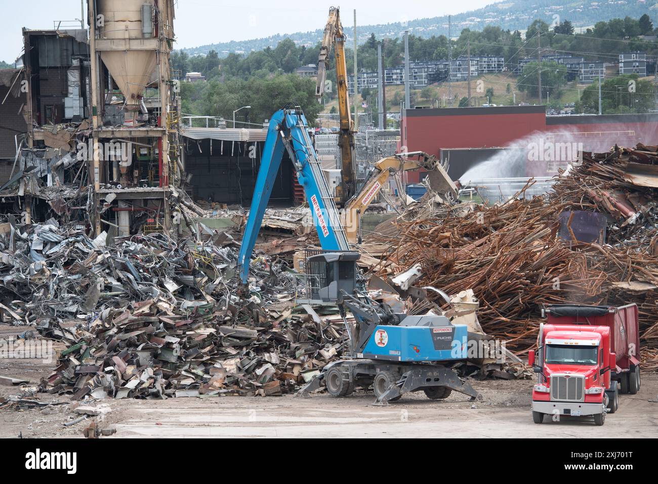 Demolition crews process and remove tons of materials from the ...