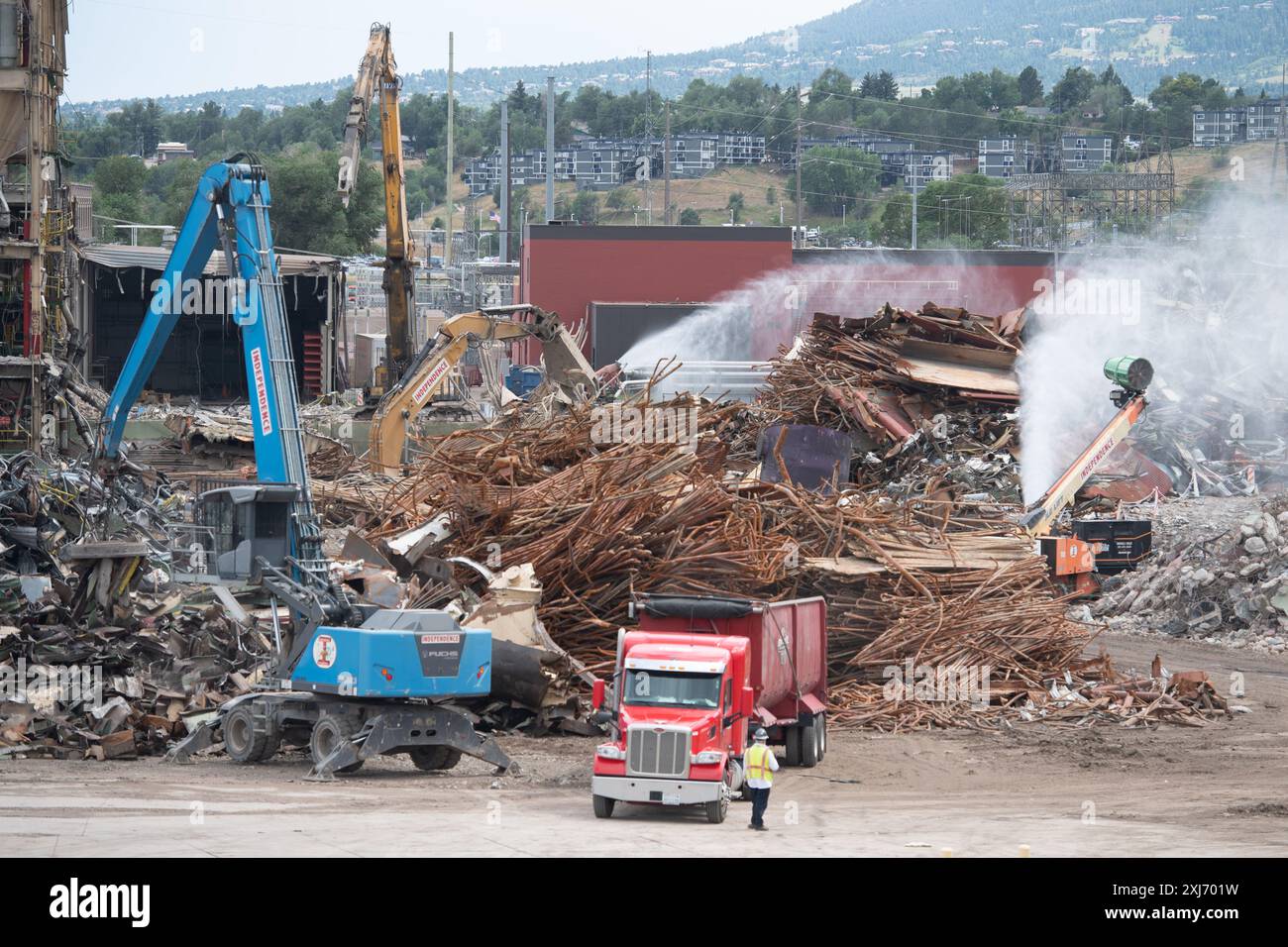 Demolition crews process and remove tons of materials from the ...