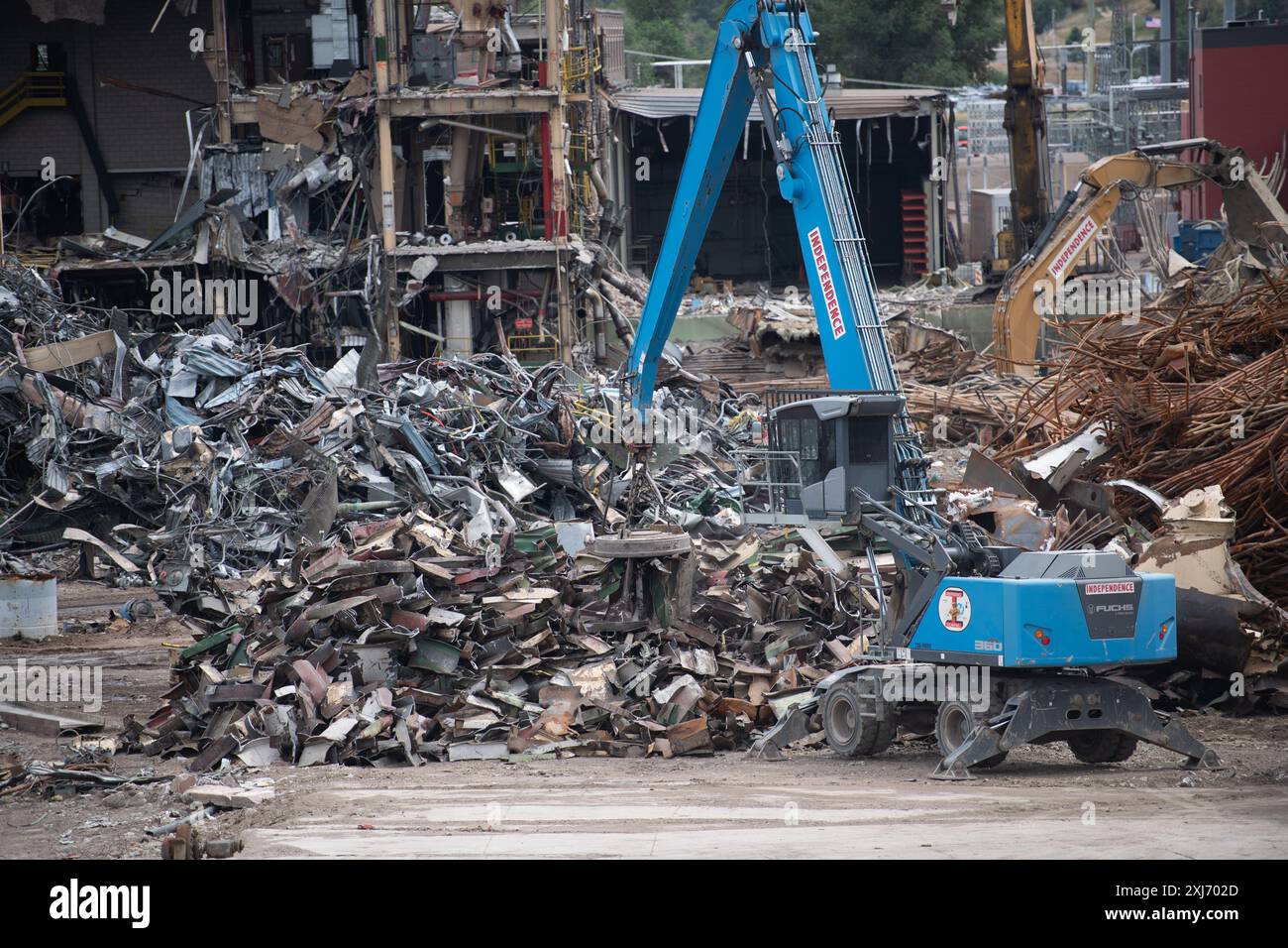 Demolition crews process and remove tons of materials from the ...