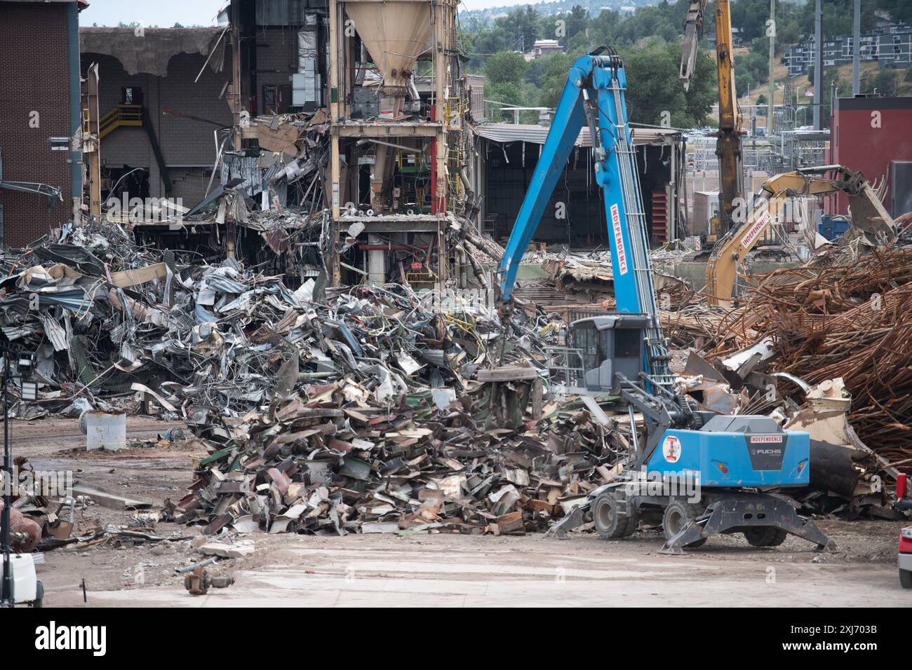 Demolition crews process and remove tons of materials from the ...