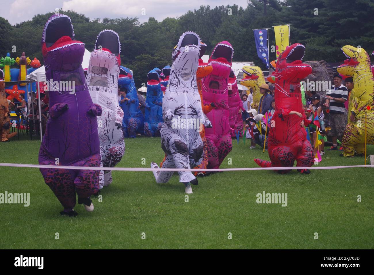 Inflatable dinosaur costume hi-res stock photography and images - Alamy