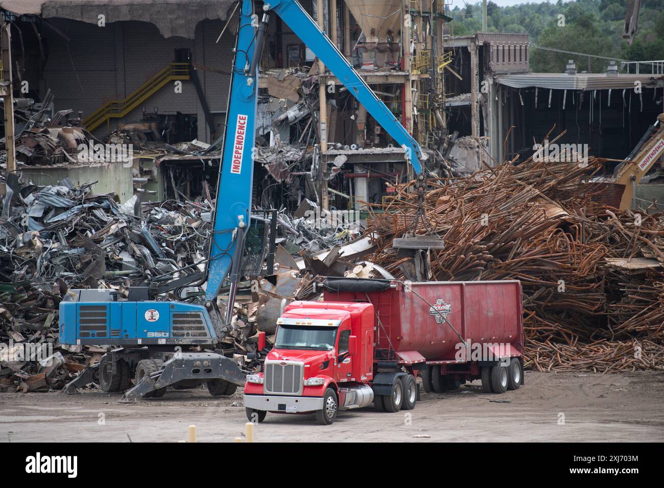 Demolition crews process and remove tons of materials from the ...