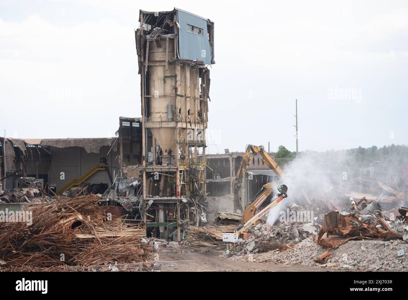 Demolition crews process and remove tons of materials from the ...