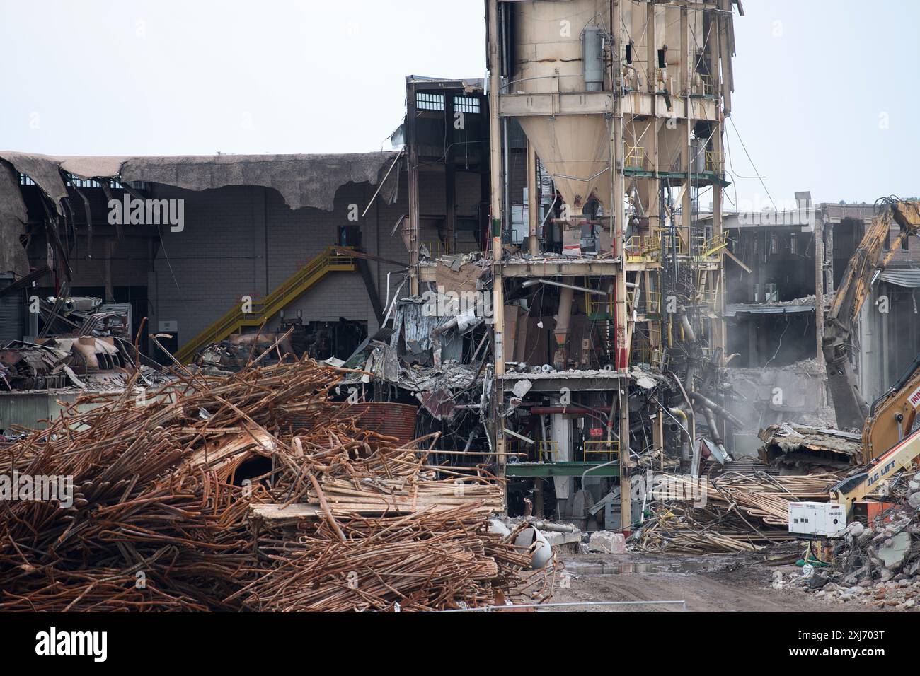 Demolition crews process and remove tons of materials from the ...