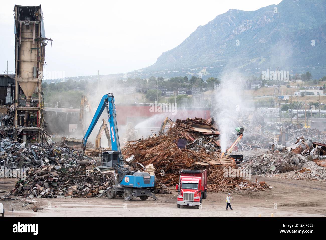 Demolition crews process and remove tons of materials from the ...