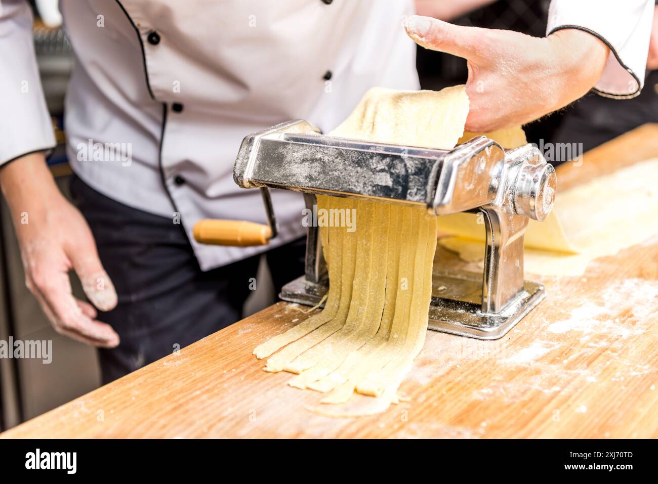 Chef making pasta machine hi-res stock photography and images - Alamy