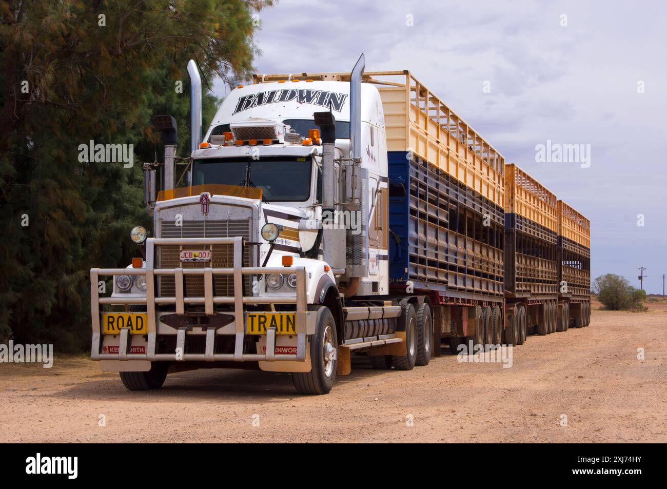 A long, articulated heavy goods vehicle (HGV) known in Australia as a ...