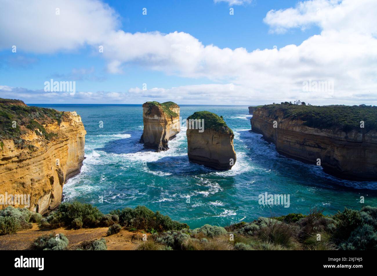The limestone sea stacks known as Tom and Eva viewed from the Great ...