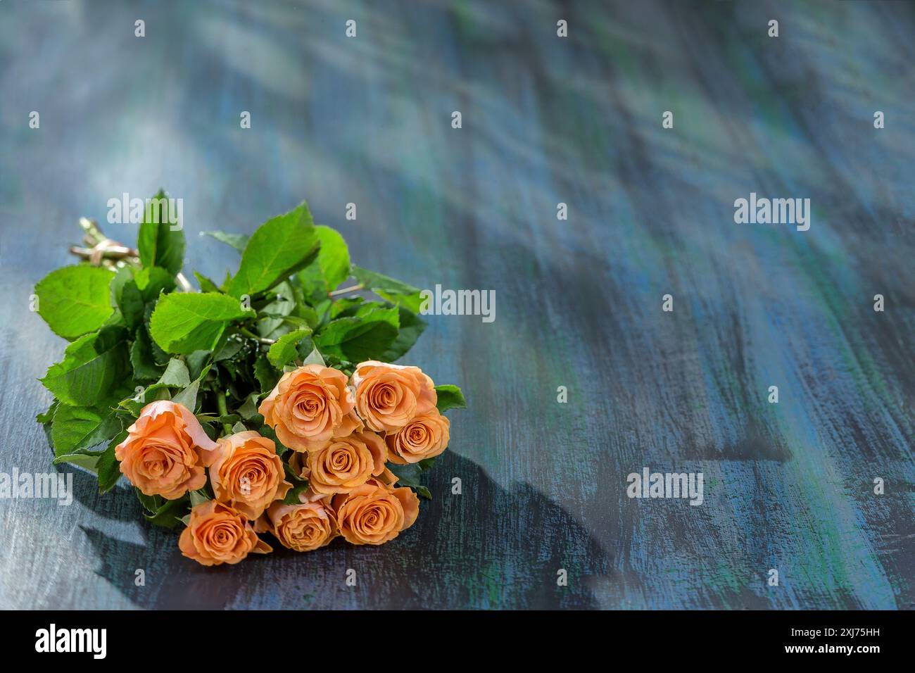 Bunch of orange-colored roses Stock Photo - Alamy