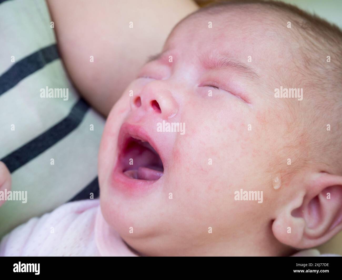 newborn baby girl crying Stock Photo - Alamy