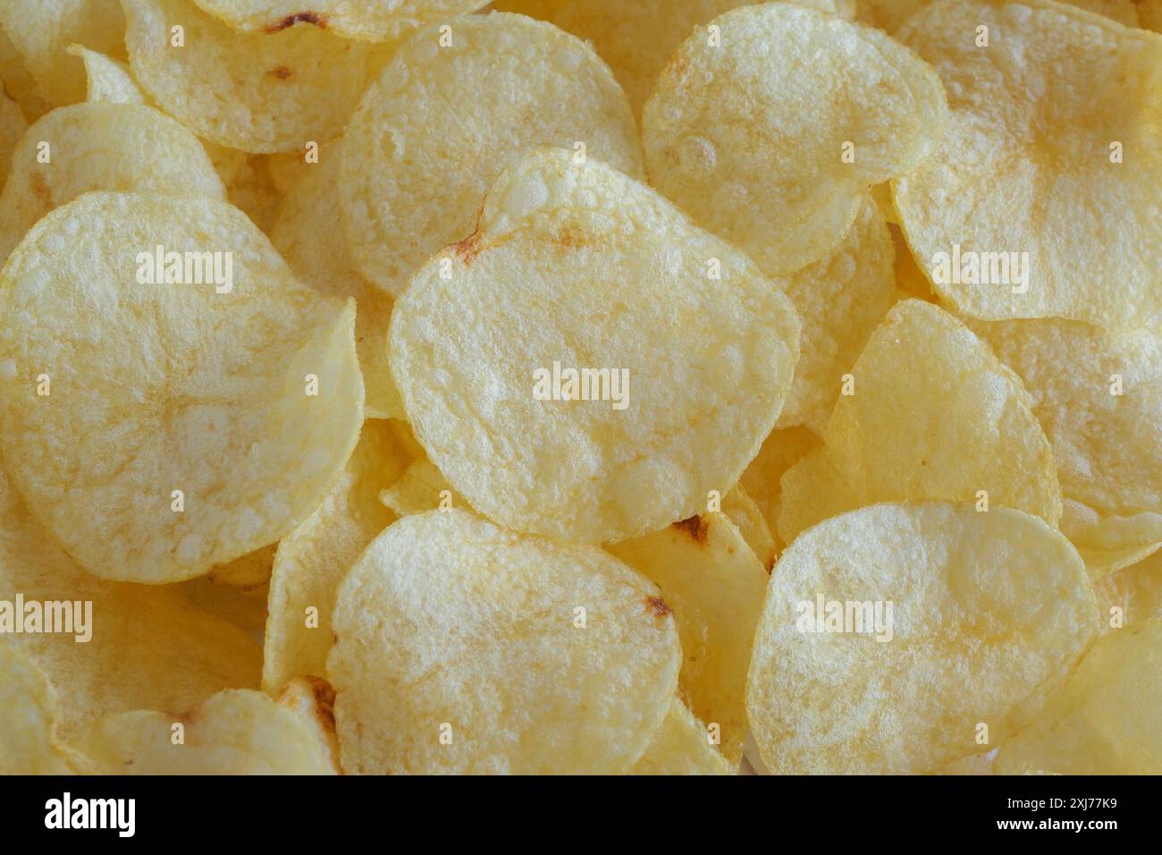 crispy potato chips snack texture background Stock Photo - Alamy