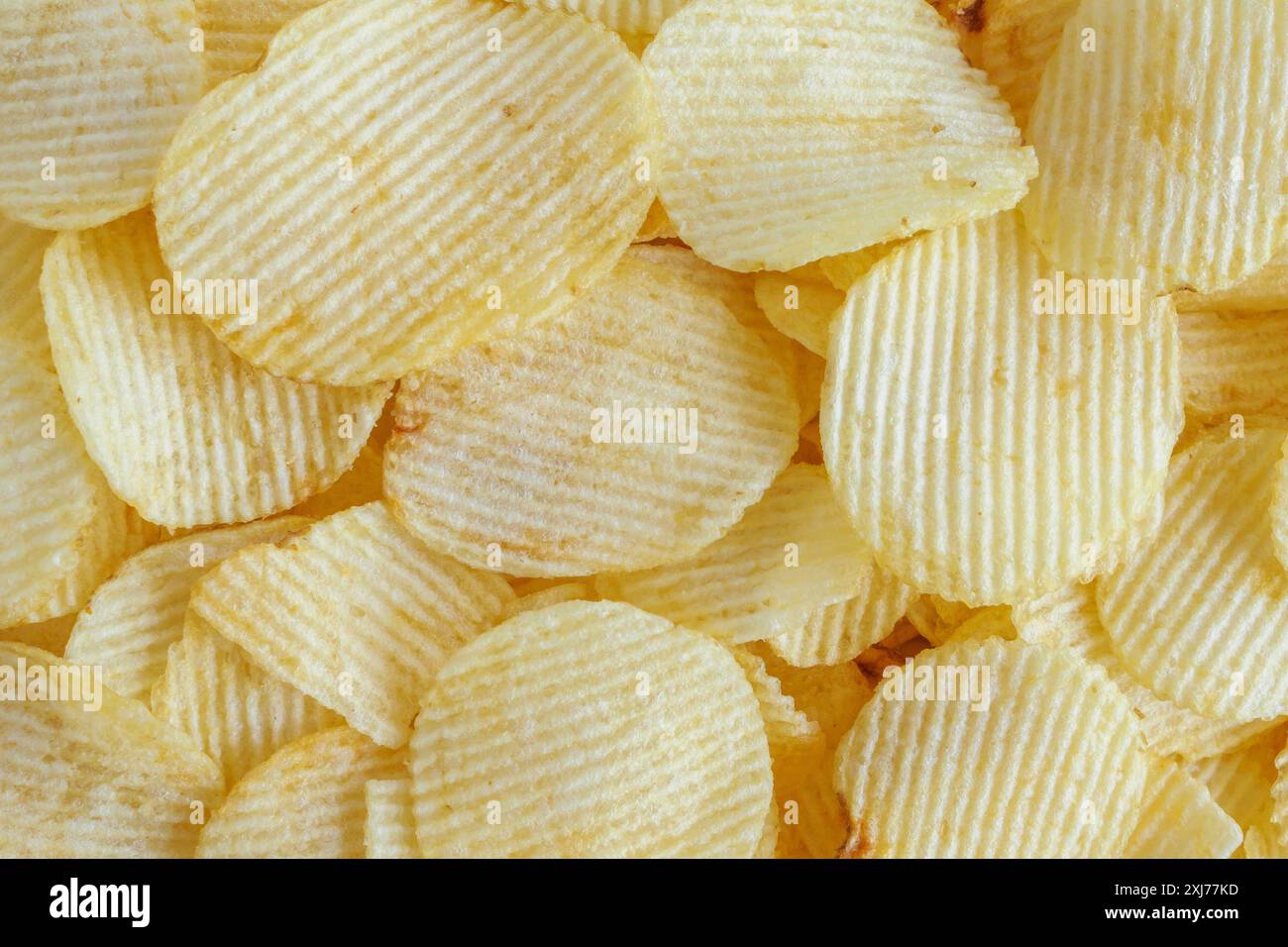 crispy potato chips snack texture background Stock Photo - Alamy