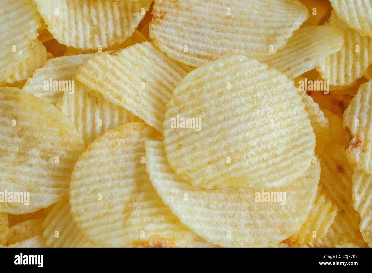 crispy potato chips snack texture background Stock Photo - Alamy