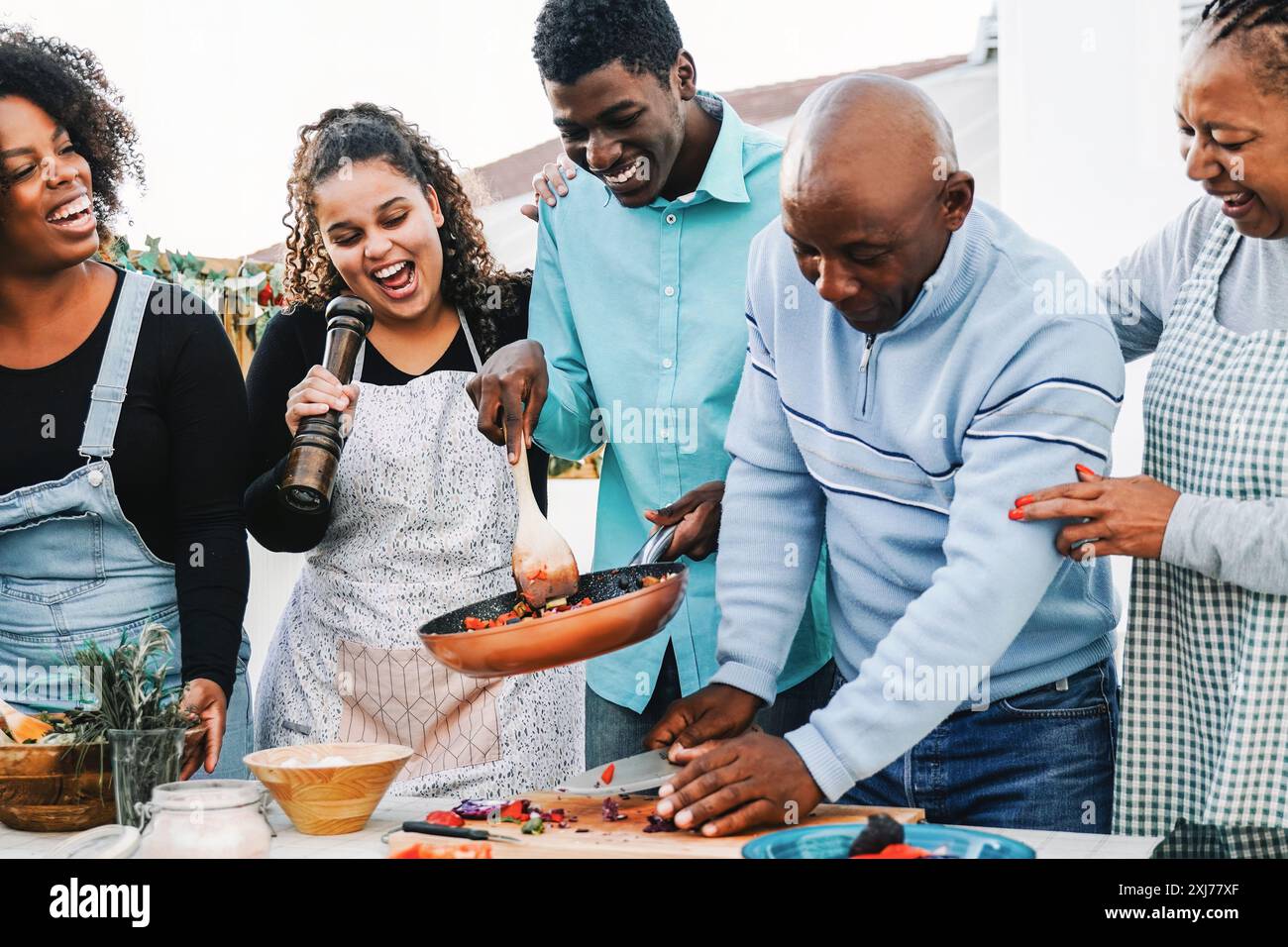 Family cooking at kitchen, Black people preparing healthy lunch outside ...
