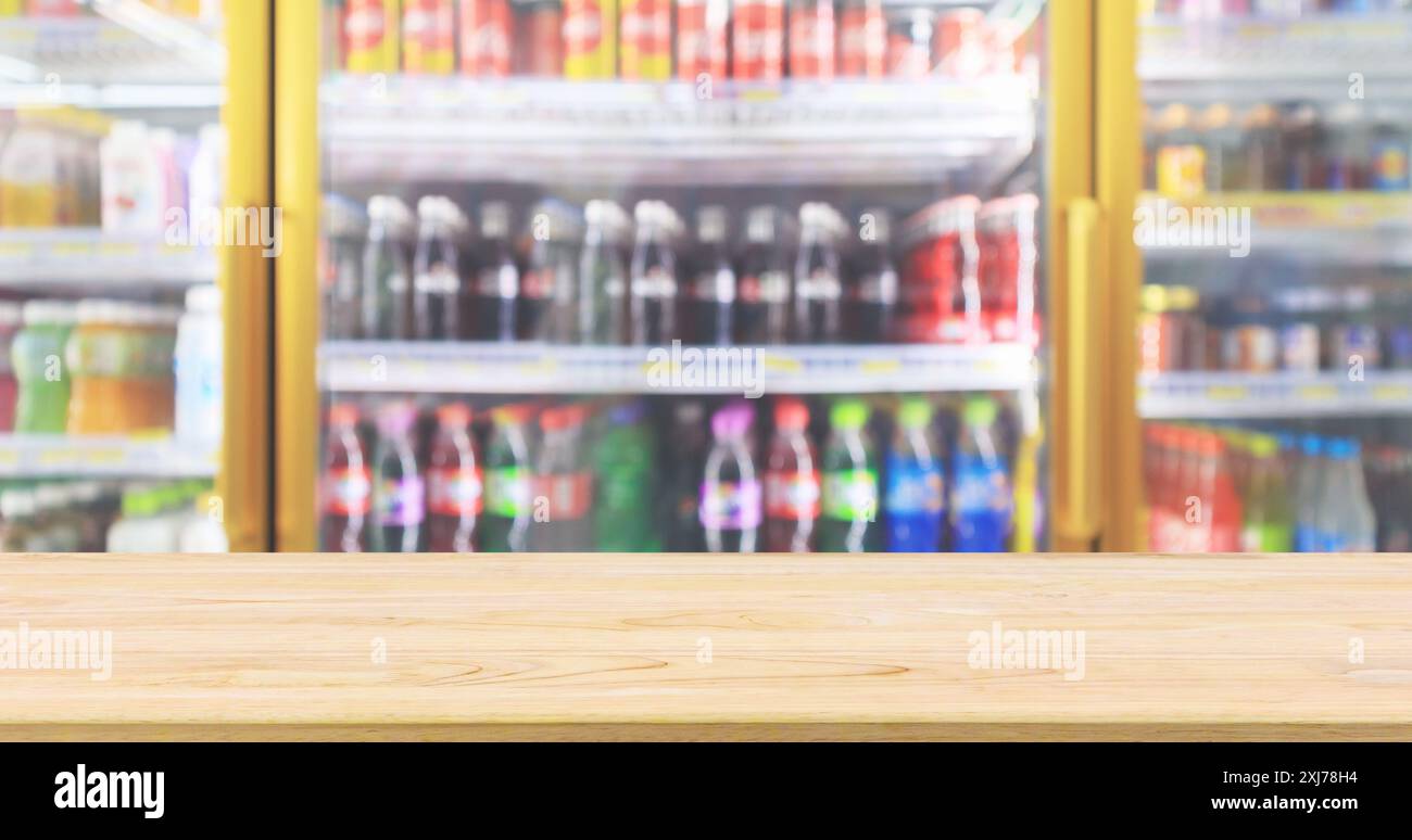 wood table top with supermarket convenience store refrigerators with ...