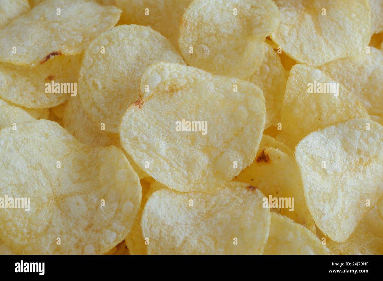 crispy potato chips snack texture background Stock Photo - Alamy