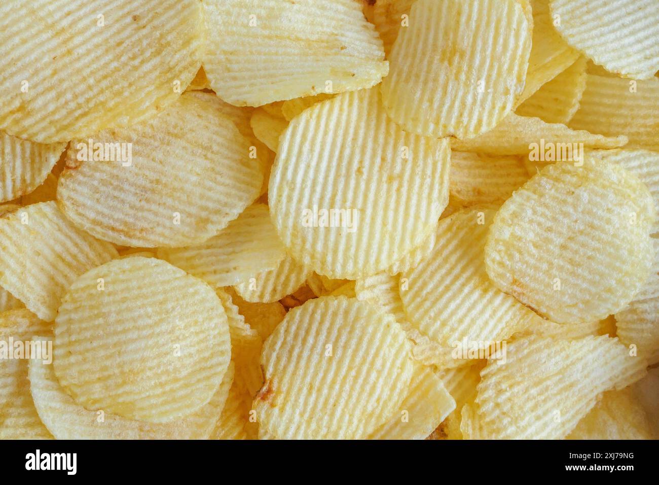 crispy potato chips snack texture background Stock Photo - Alamy