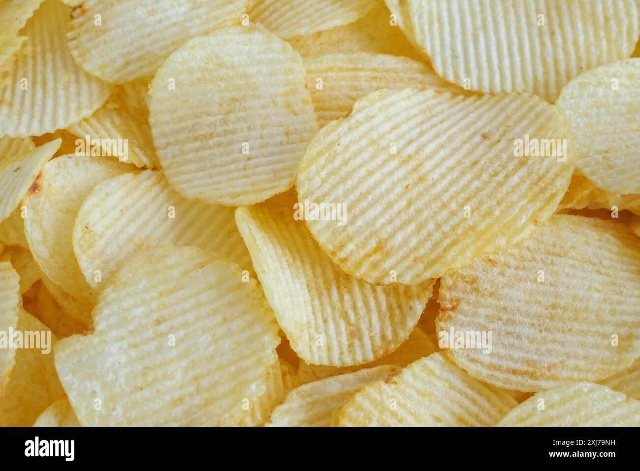 crispy potato chips snack texture background Stock Photo - Alamy