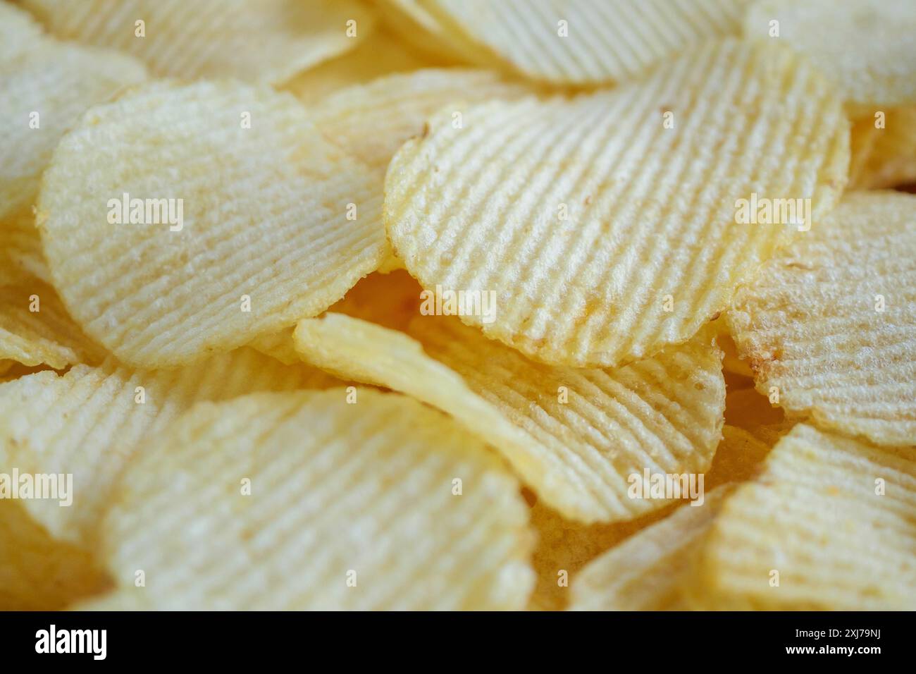 crispy potato chips snack texture background Stock Photo - Alamy