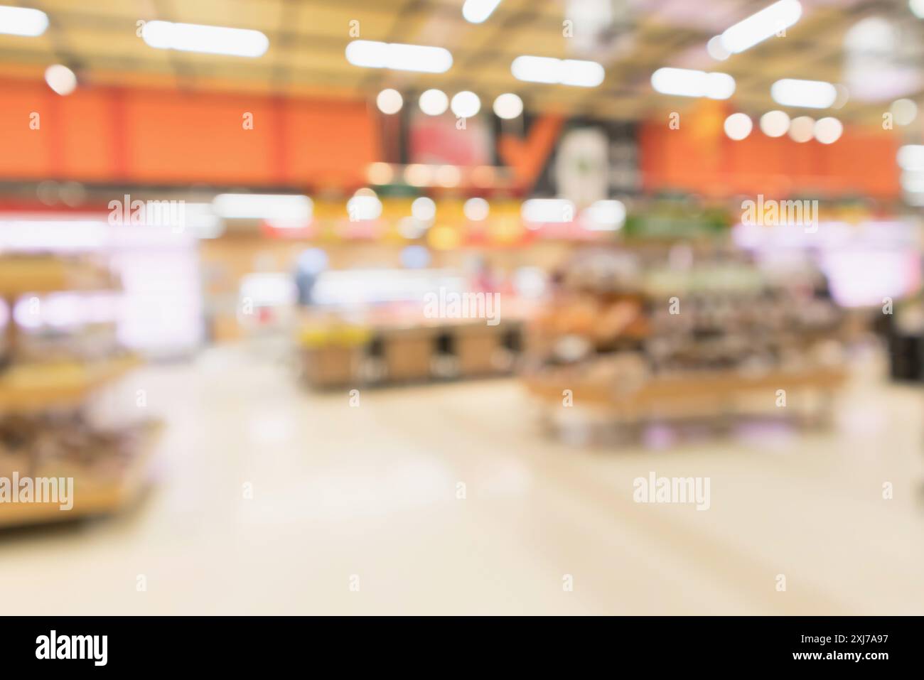 Abstract supermarket grocery store blurred defocused background with ...