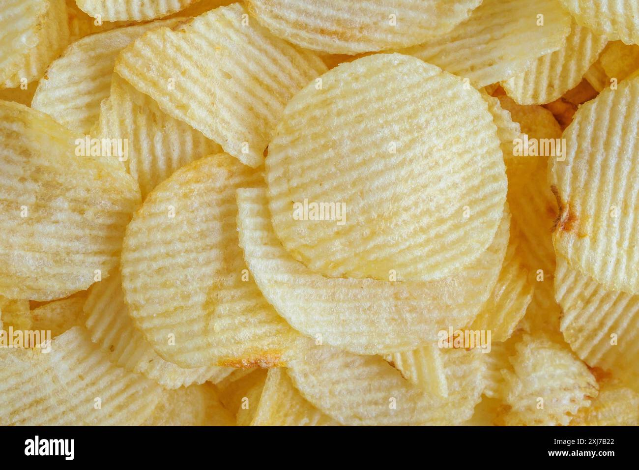 crispy potato chips snack texture background Stock Photo - Alamy