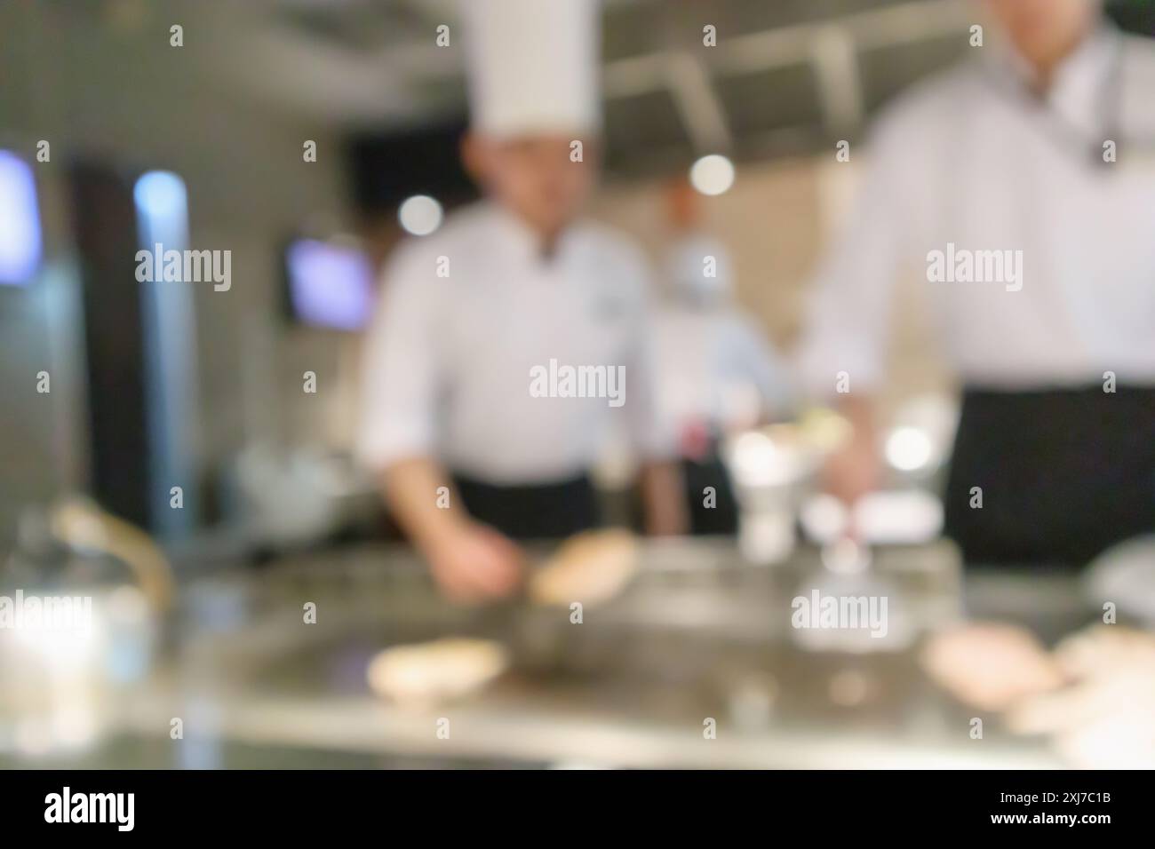 Chefs in commercial kitchen blurred hi-res stock photography and images ...