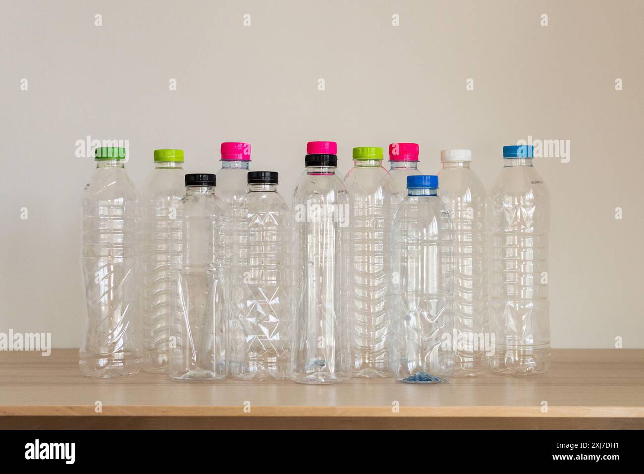 set of many plastic bottle on wood table, recycling concept Stock Photo ...