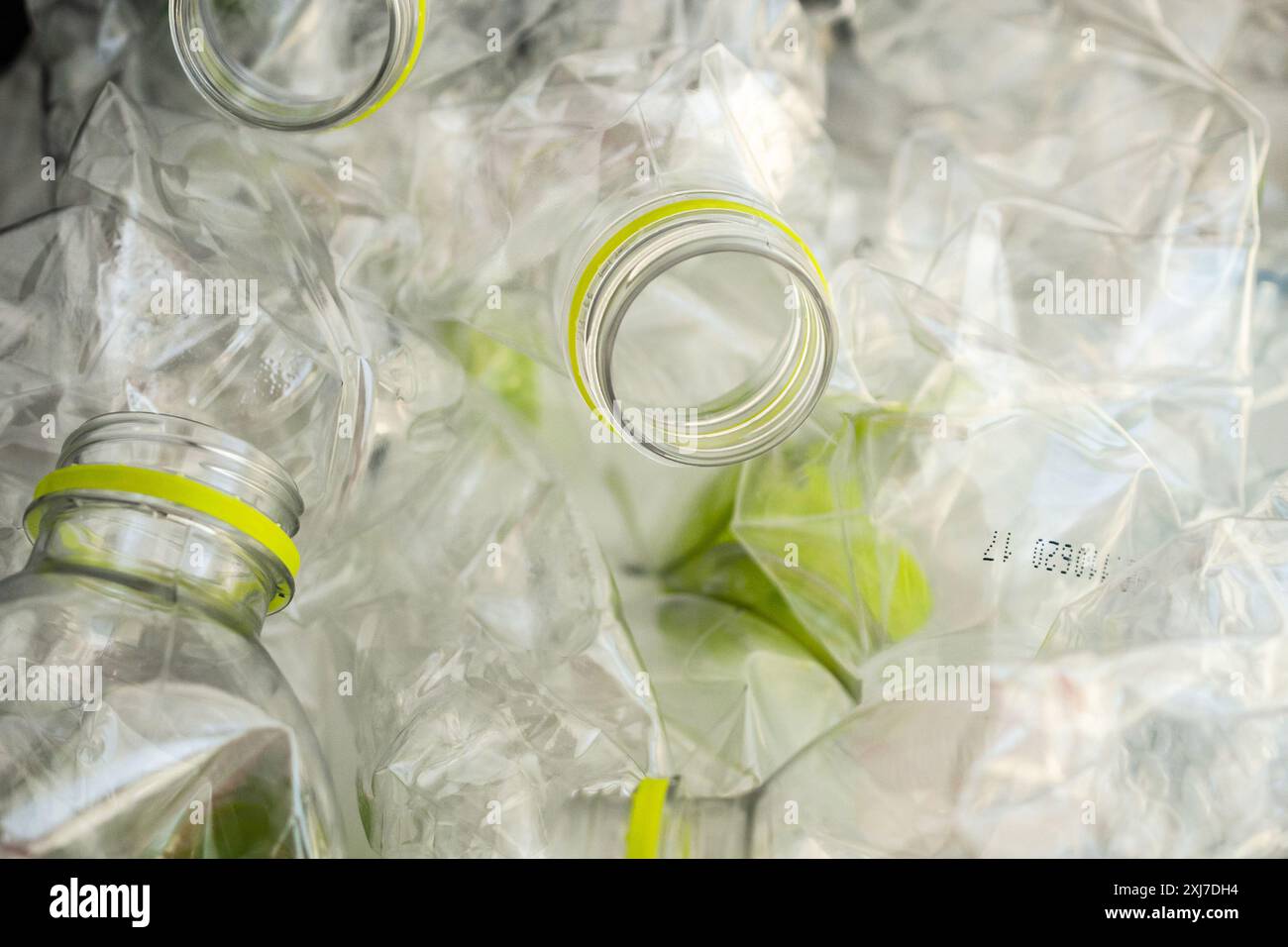Crushed plastic bottles for recycling abstract background Stock Photo ...
