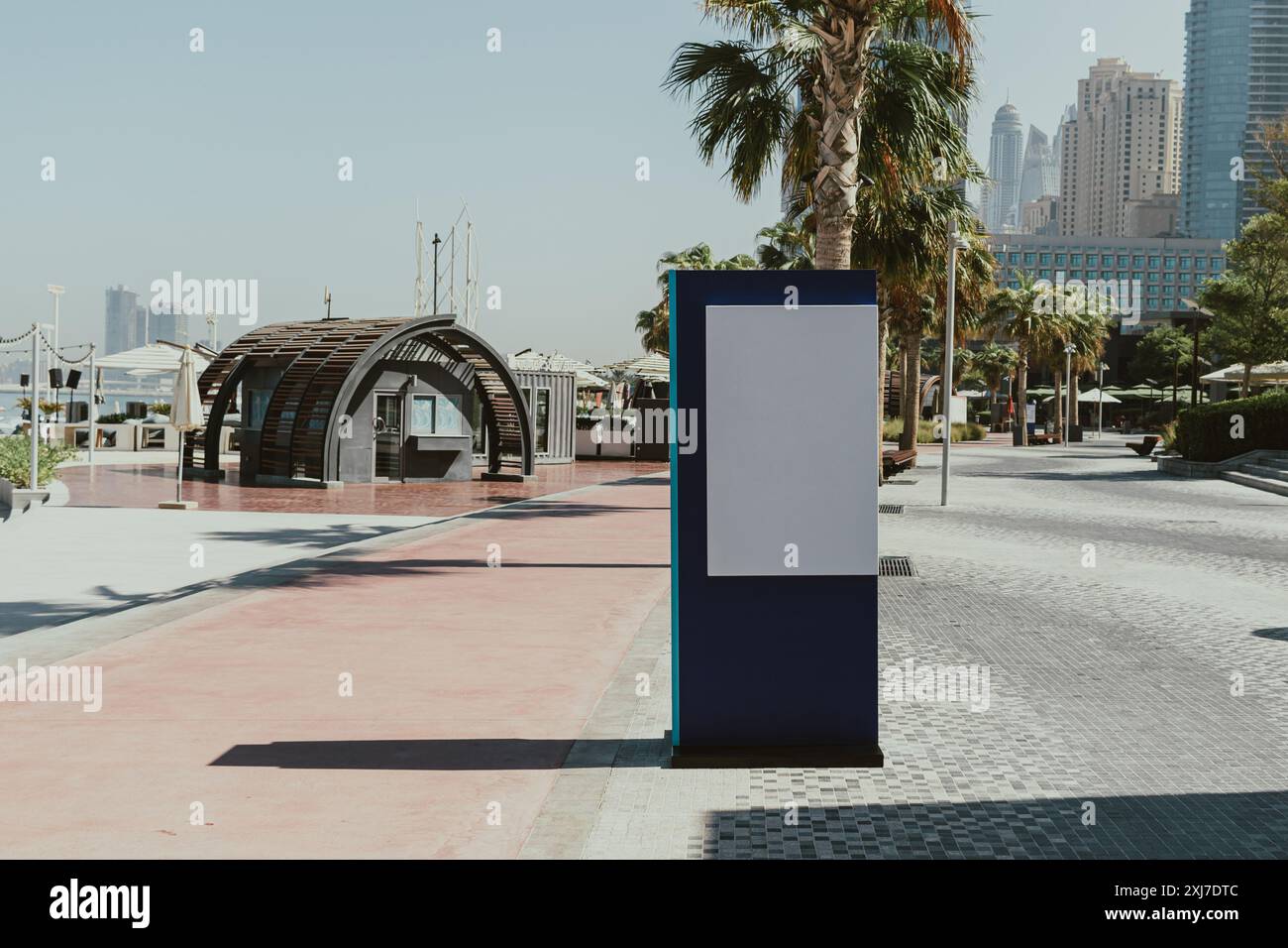 Blank signage board in urban park setting on the ground outside Stock ...