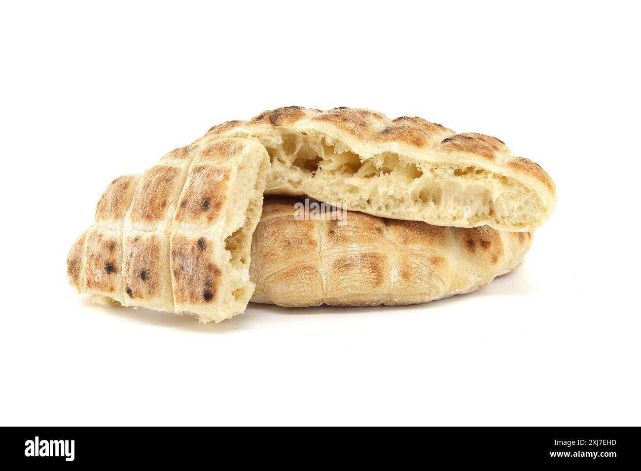 Stack of whole wheat round pita flat-breads isolated on a white ...