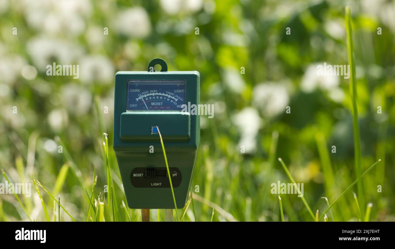 Three way meter to measure the soil pH, light and moisture level ...
