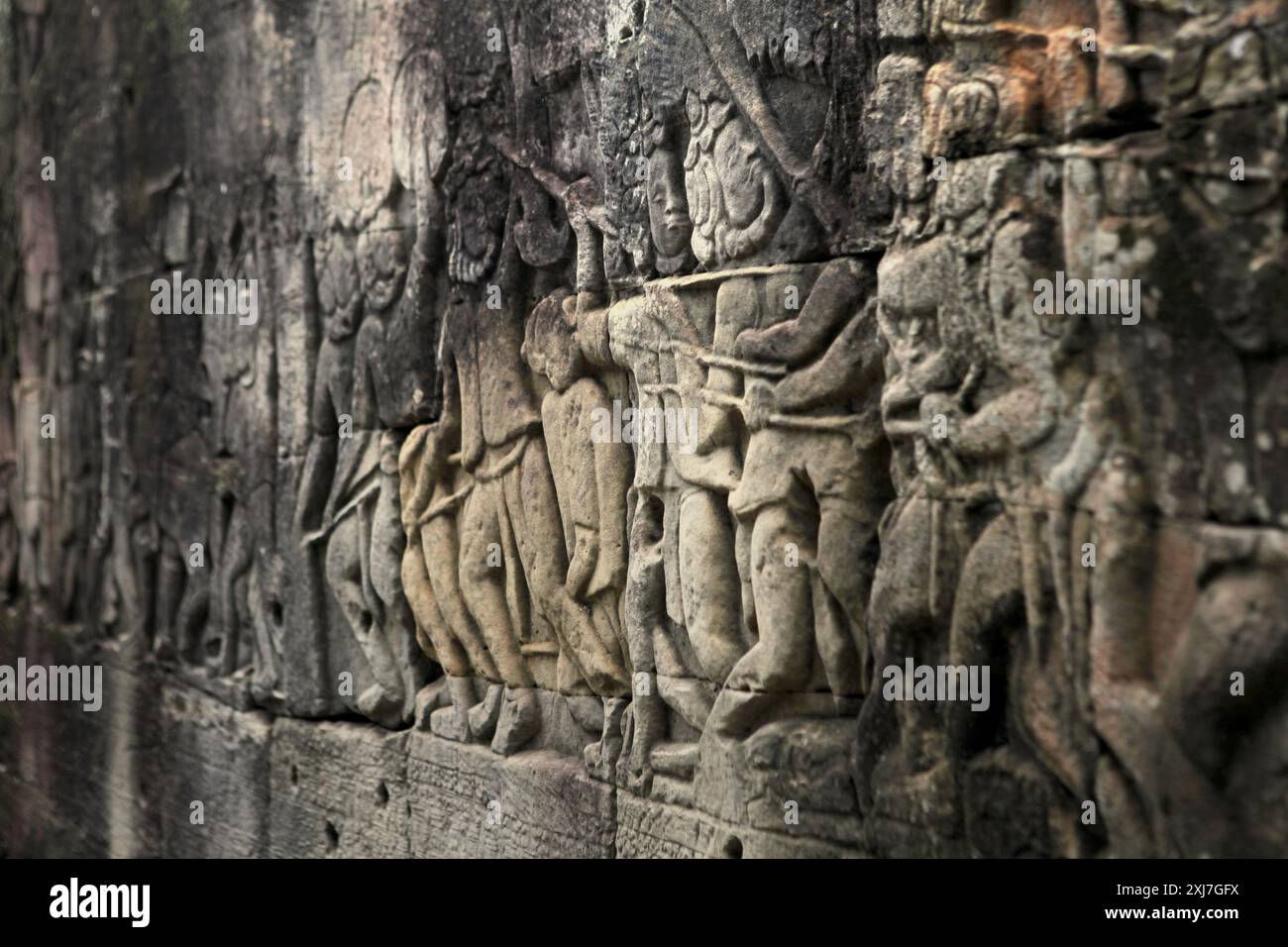Weathered bas-reliefs on the wall of Bayon temple in Angkor Thom, Siem ...