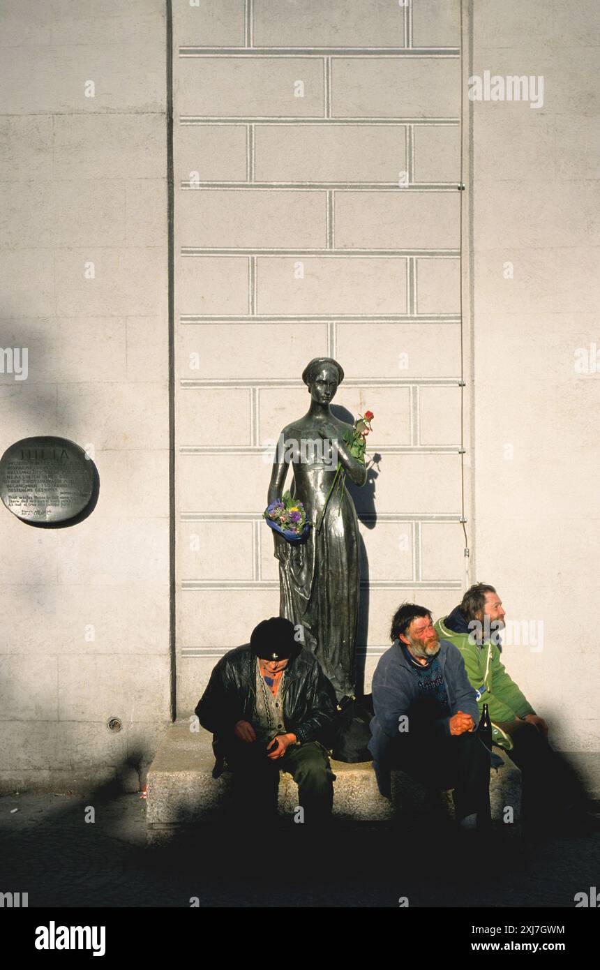 Homeless men seen with the Julia figure, Munich, Germany Stock Photo ...
