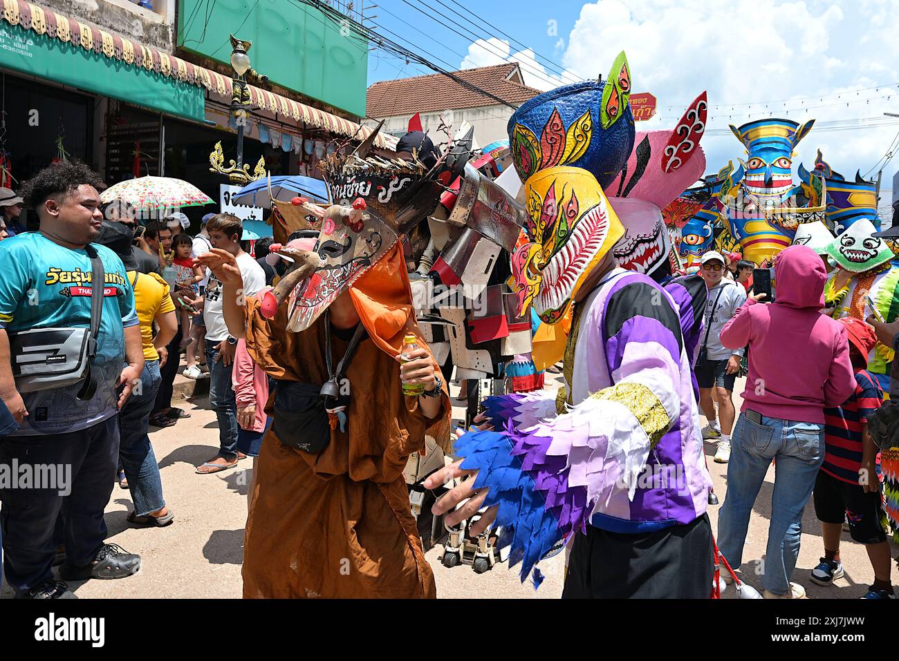 The Phi Ta Khon ghost festival is an annual masked procession ...