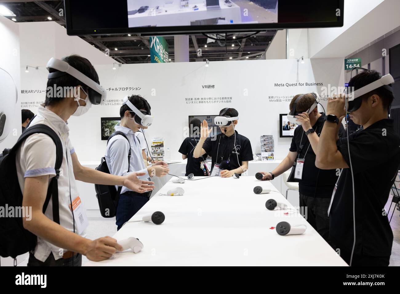 Tokyo, Japan. 04th July, 2024. Visitors of XR Fair Tokyo VR/AR/MR use a ...
