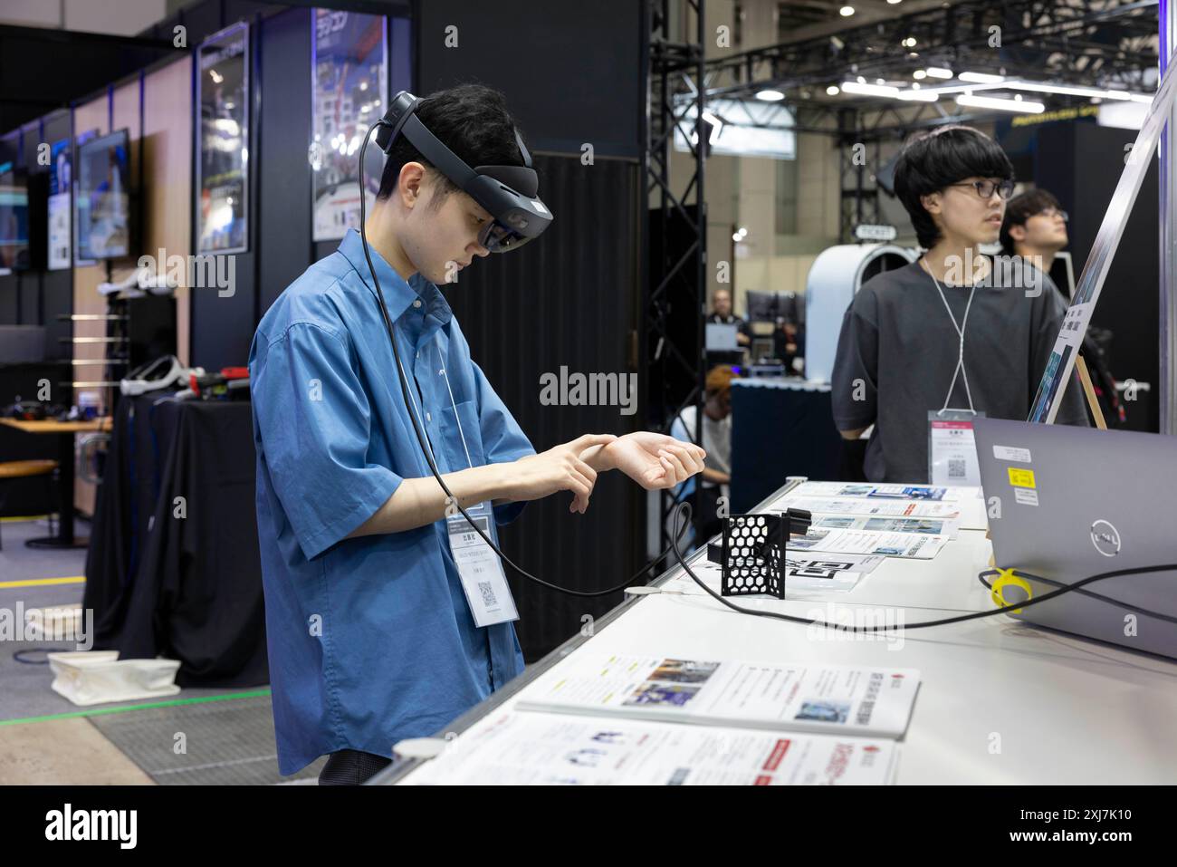 Tokyo, Japan. 04th July, 2024. Visitor of XR Fair Tokyo VR/AR/MR uses a ...