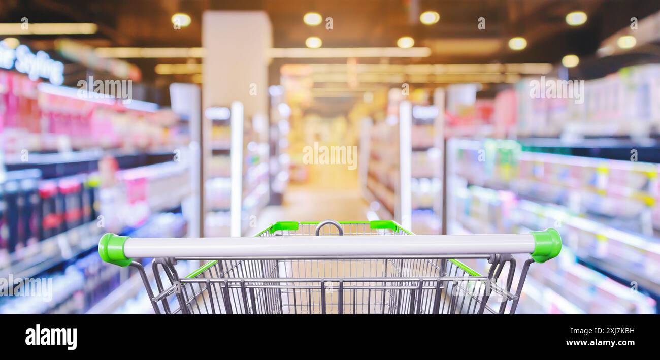 Empty shopping cart with supermarket aisle with cosmetic healthcare ...