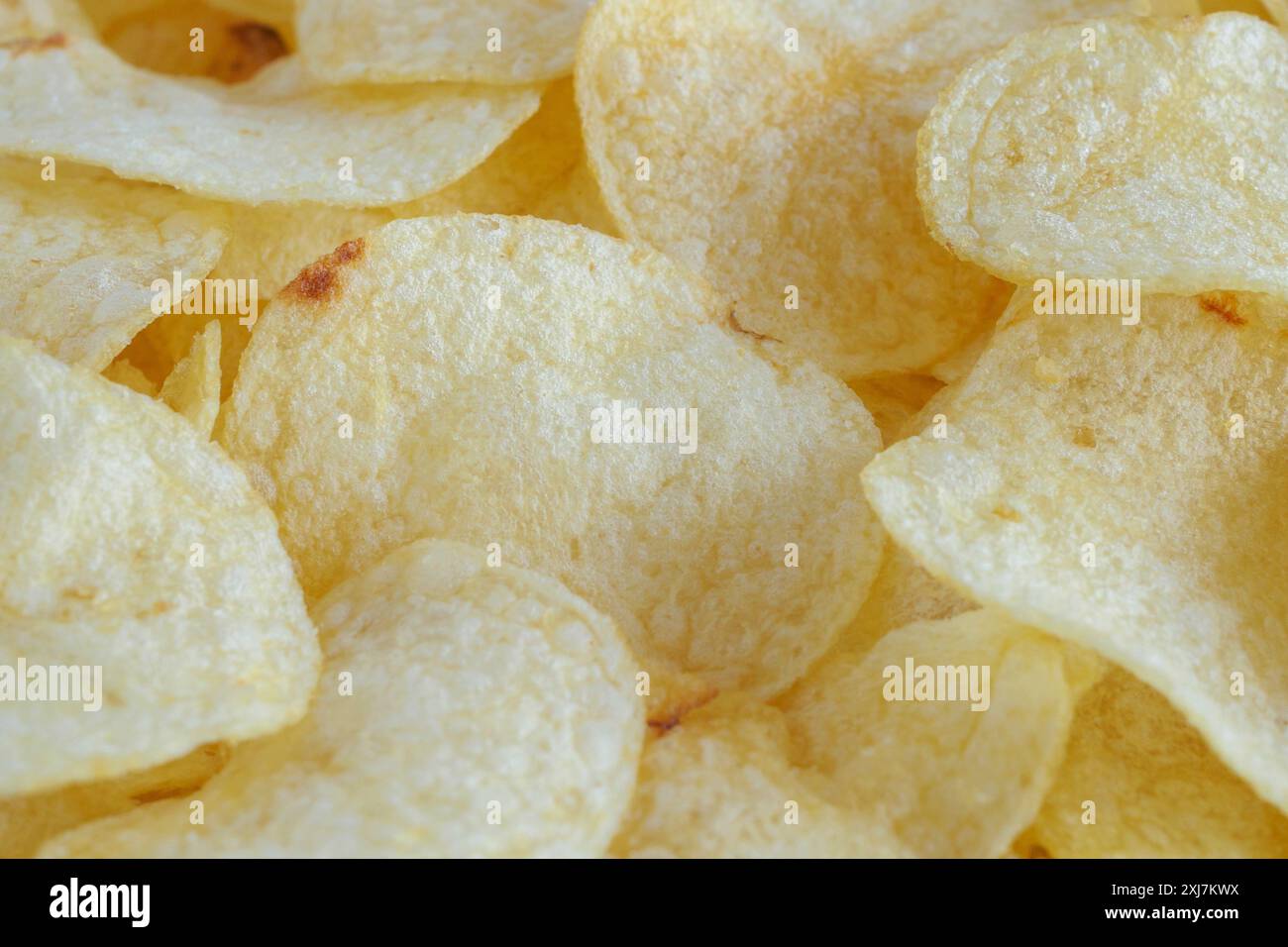 crispy potato chips snack texture background Stock Photo - Alamy